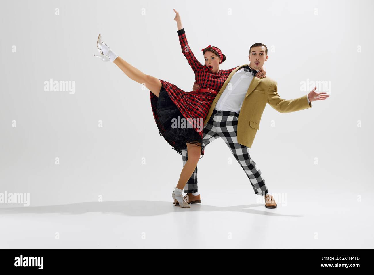 Playful moment captured between a dancing couple, young handsome man ...