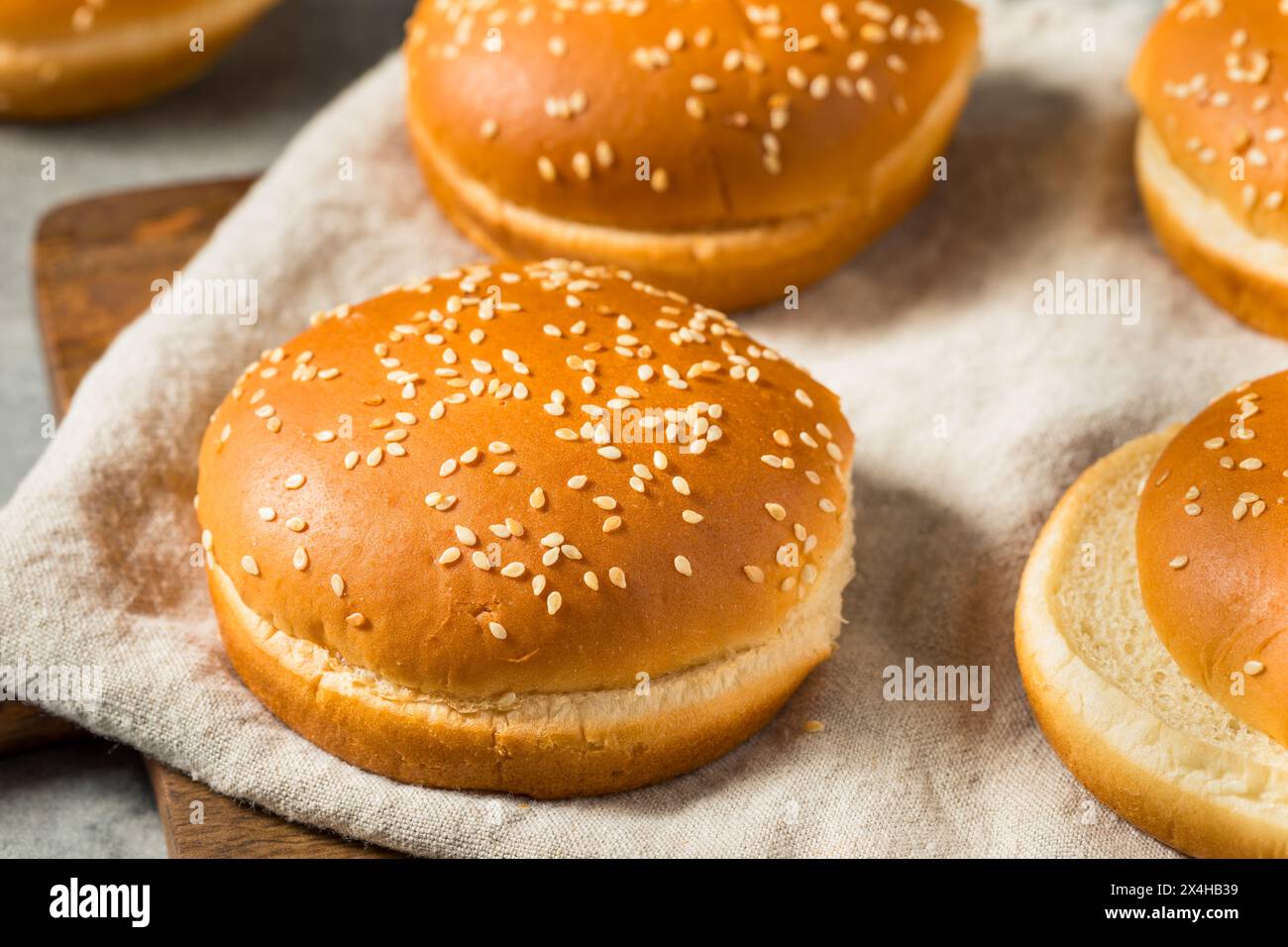 Classic Sesame Seed hamburger Bun in a Bunch Stock Photo - Alamy