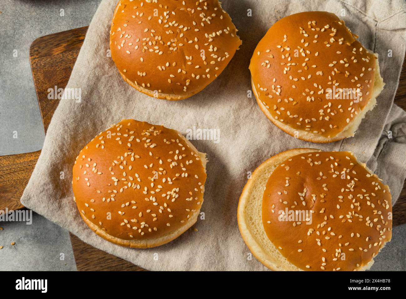 Classic Sesame Seed hamburger Bun in a Bunch Stock Photo - Alamy