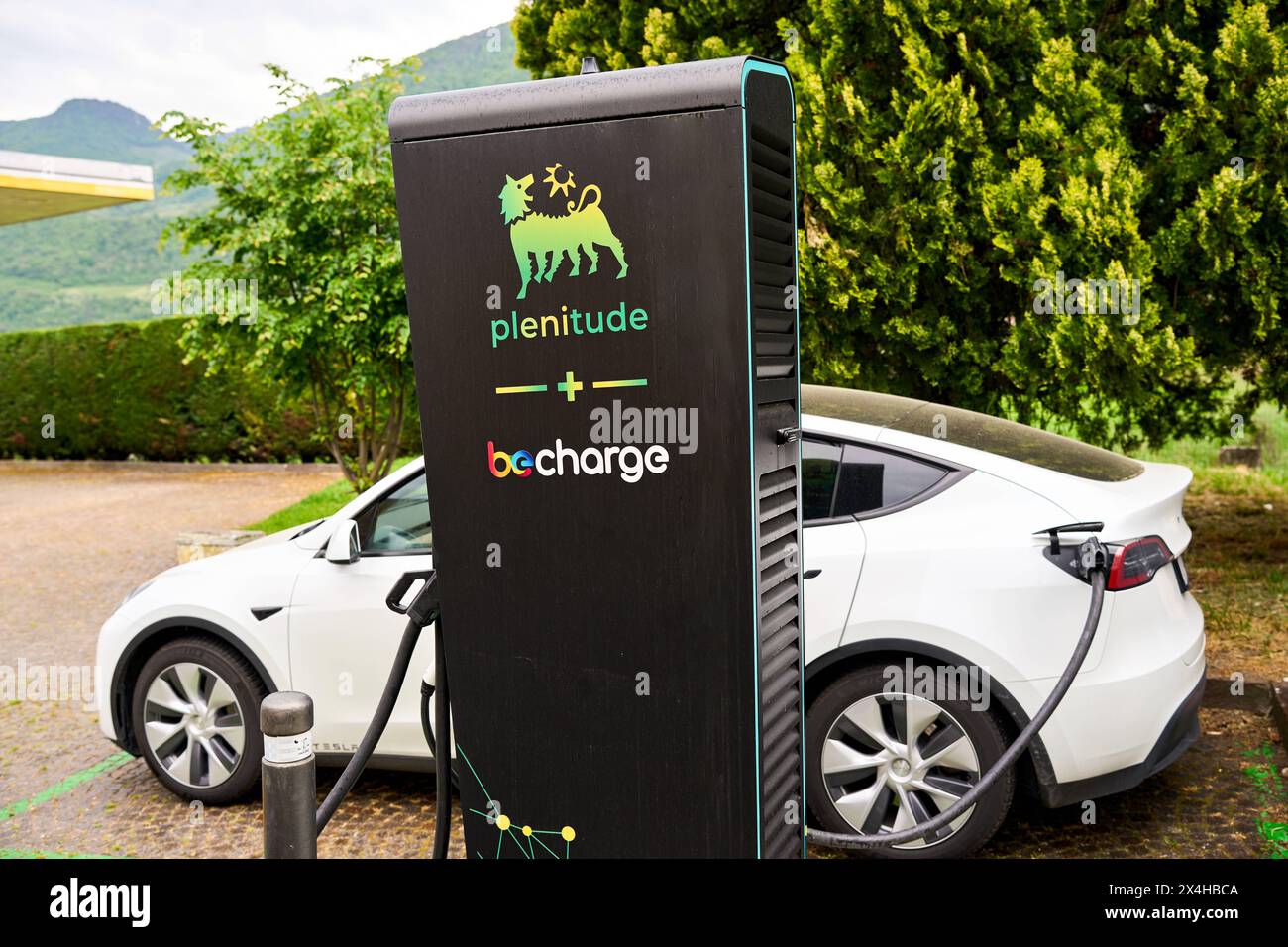 Italy - 01 May : Plenitude BeCharge charging station in a parking lot ...
