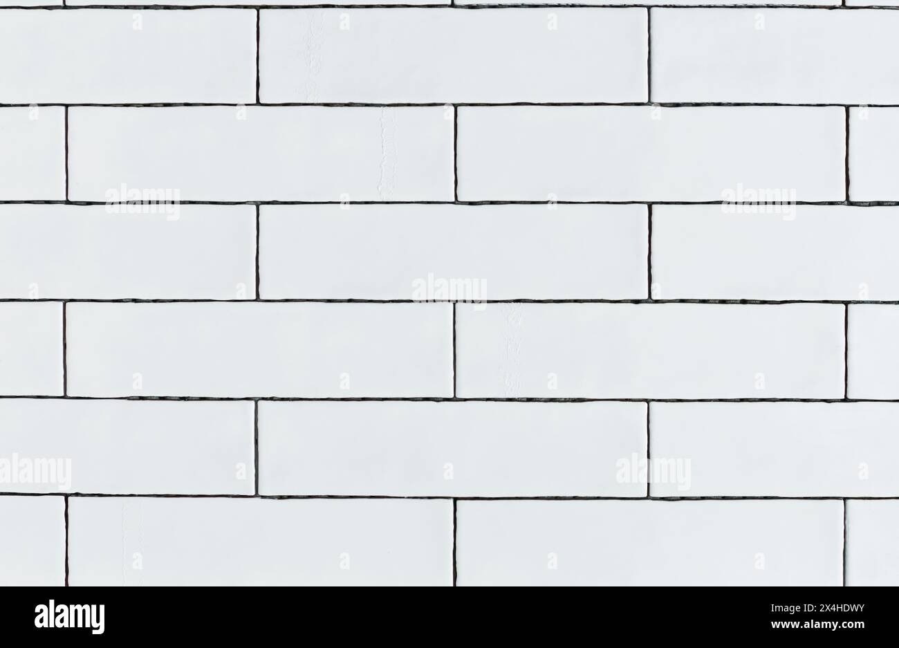 White light brick tiles wall texture wide background in rustic style ...