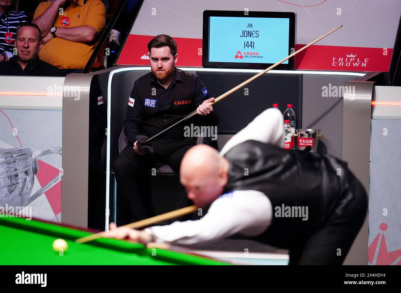 Jak Jones watches on during their semi-final match against Stuart ...