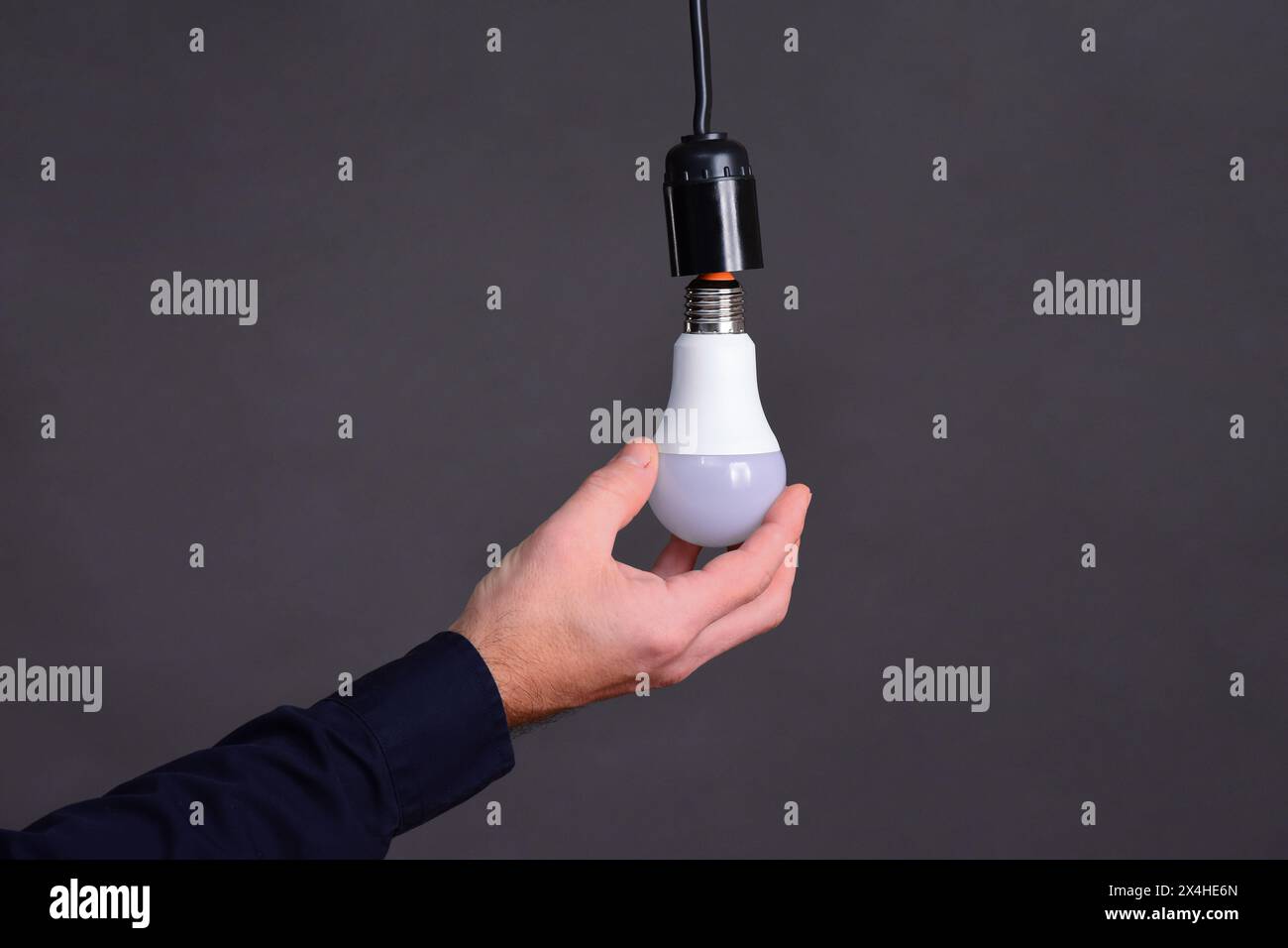 Installation of an LED lamp Stock Photo - Alamy