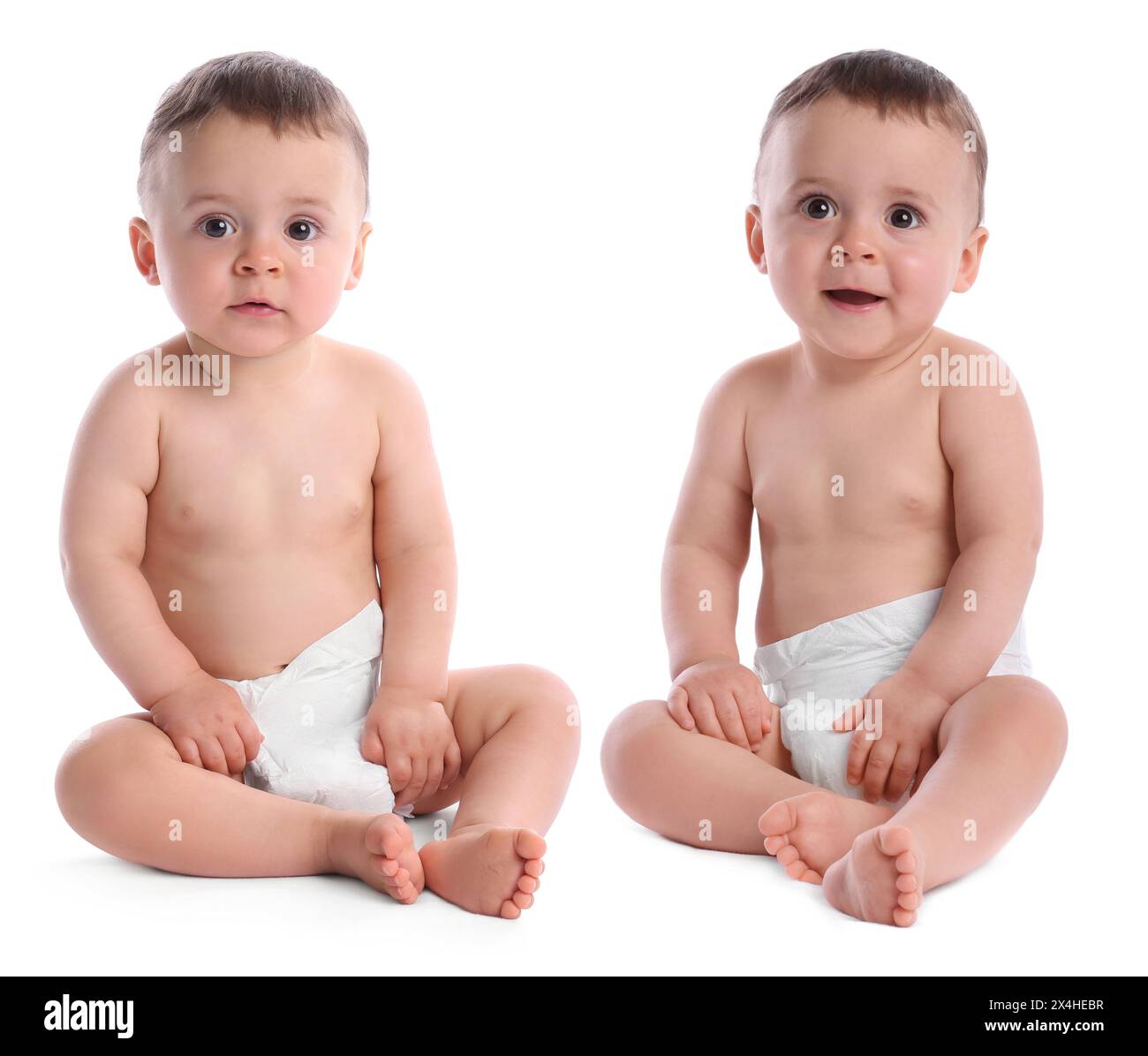Portrait of cute twin babies on white background Stock Photo - Alamy