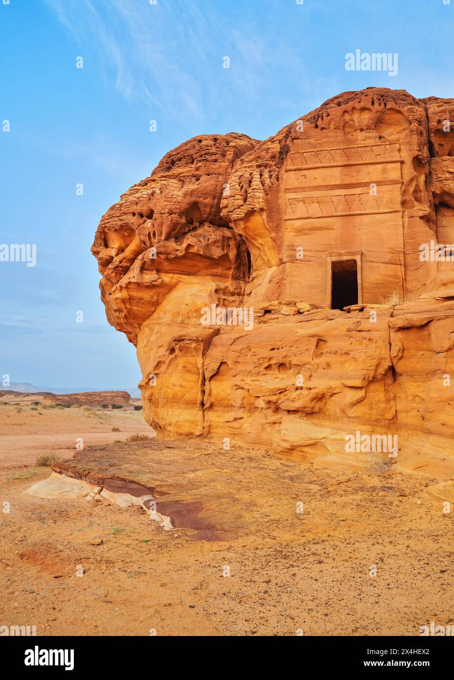 Old Nabatean architecture carved on orange sandstone wall at Jabal Al ...