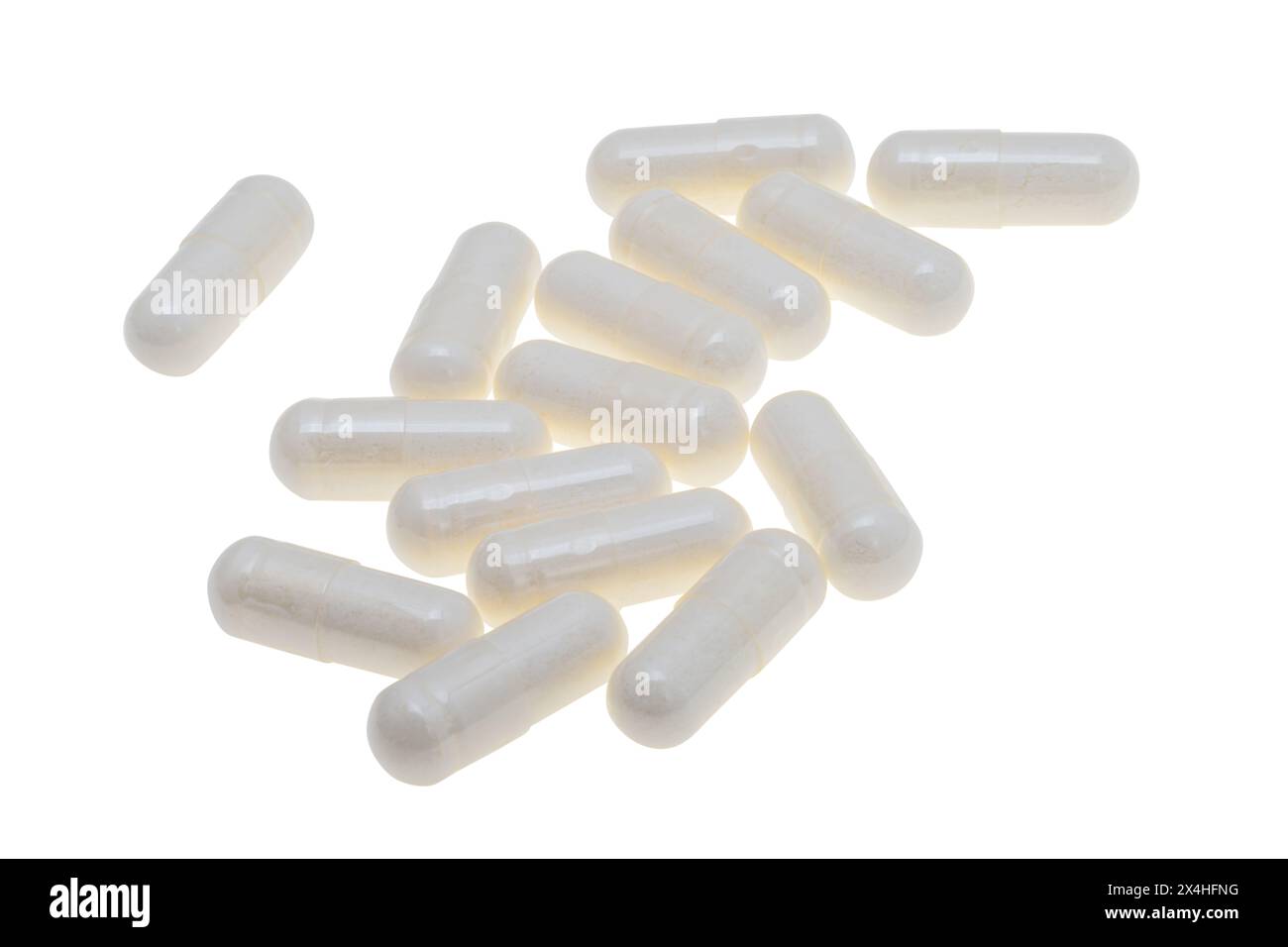 white capsules isolated on white background Stock Photo - Alamy