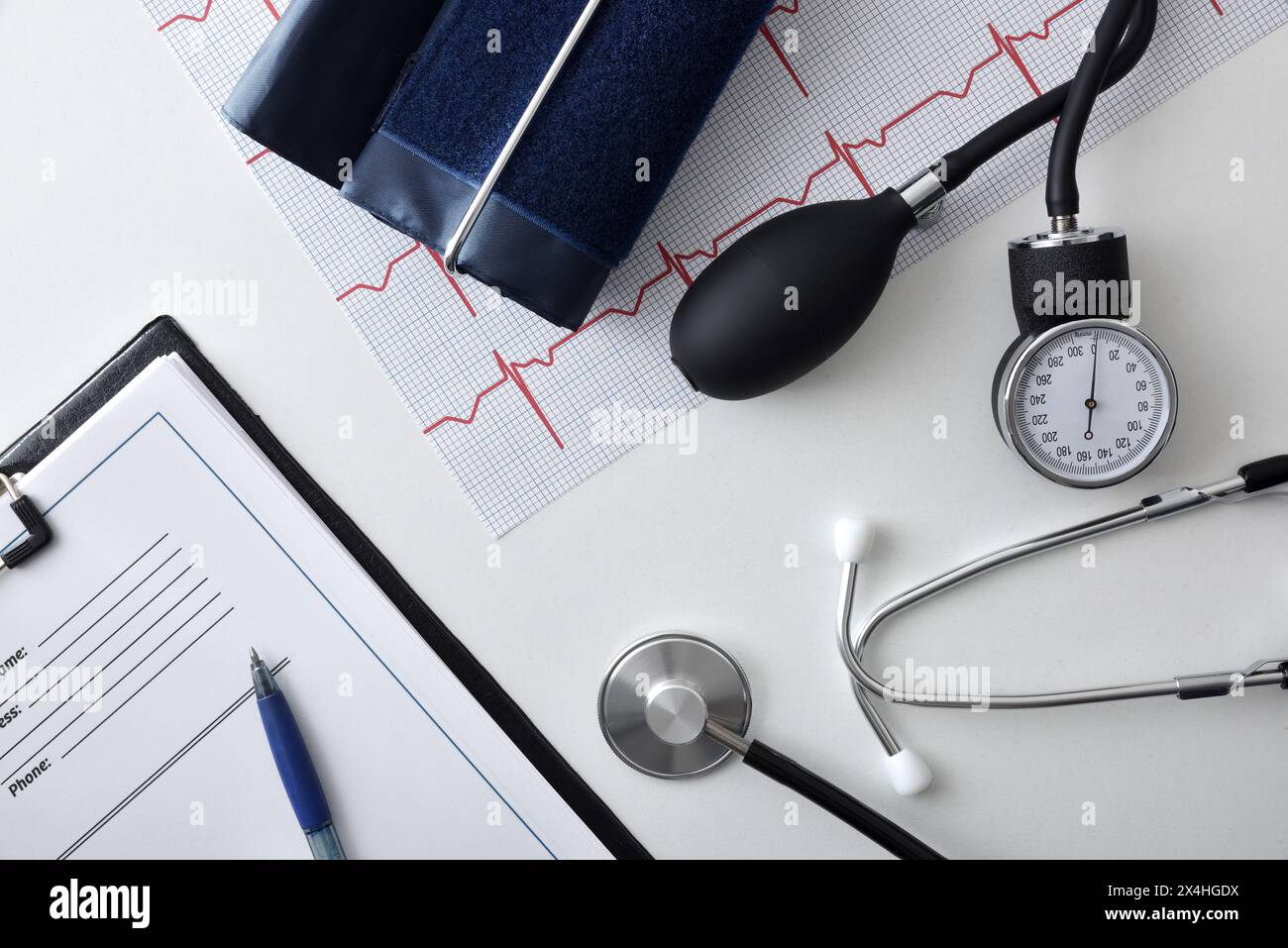 Heart health and blood pressure check with measuring tools on white ...