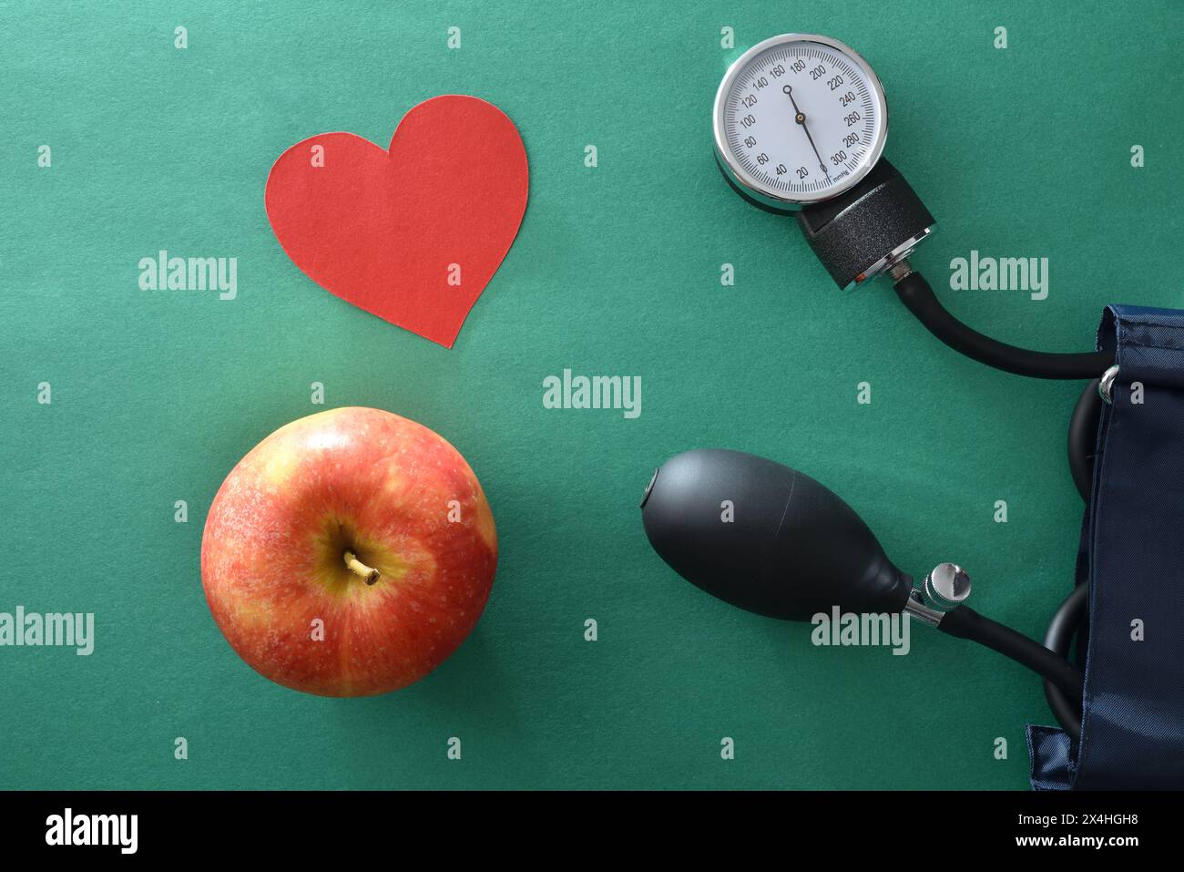 Concept of blood pressure control with a healthy lifestyle with apple ...