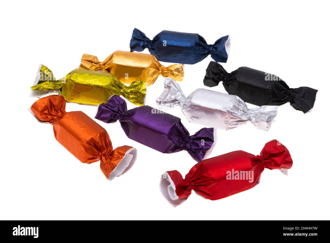 chocolate candies in wrapper isolated on white background Stock Photo ...