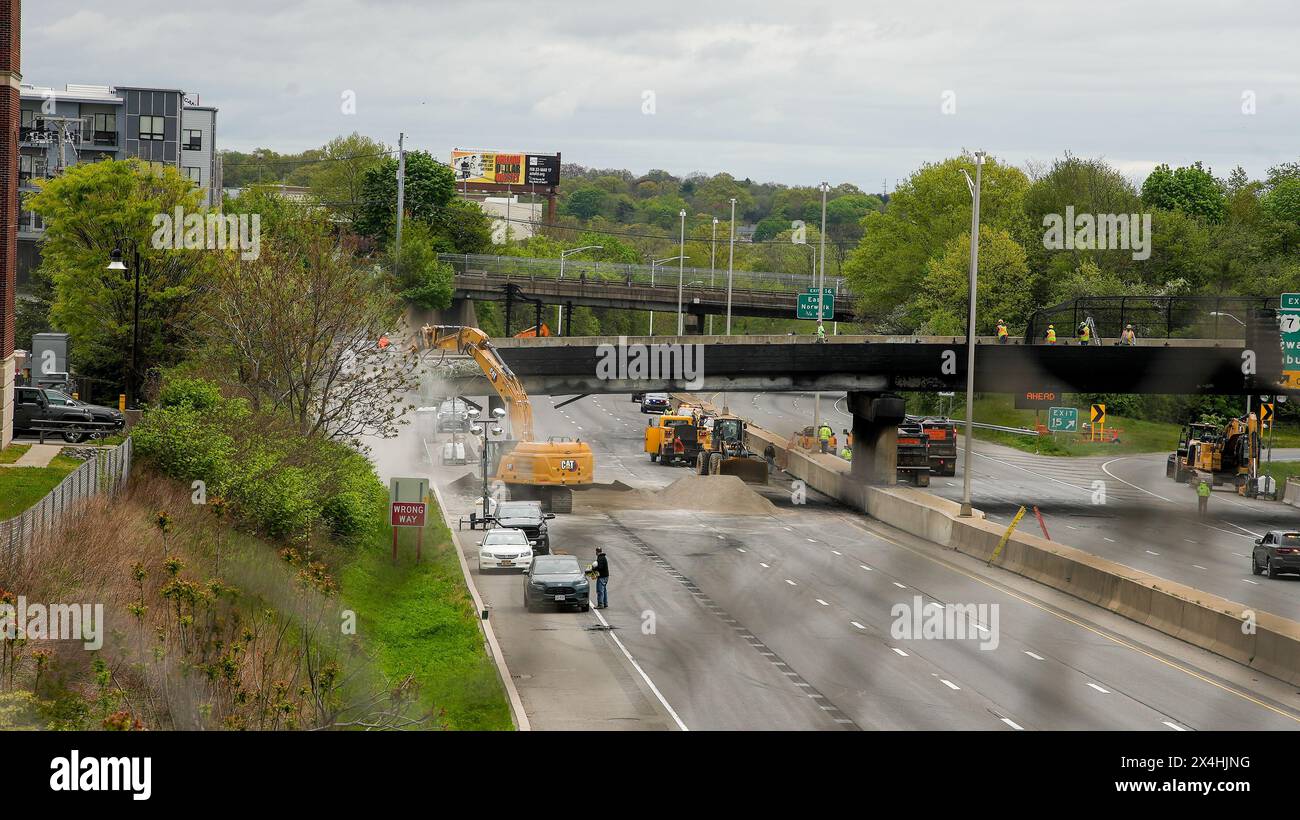 NORWALK, CT, USA- MAY 3, 2024: Demolishing bridge from tractor-trailer ...