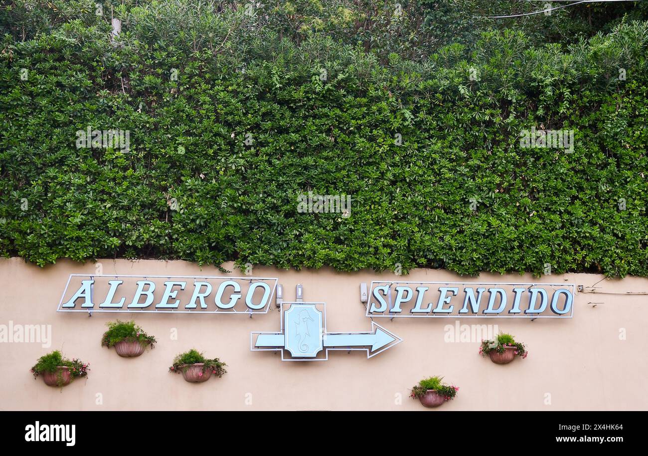 Direction sign to the luxury Belmond Hotel Splendido 5-star hotel on a ...