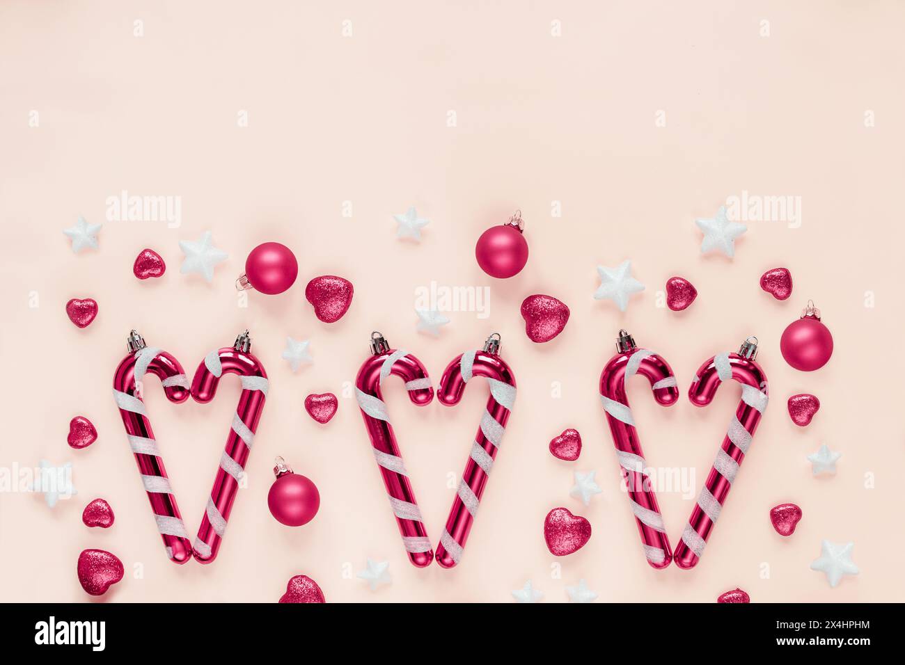 Christmas themed arrangement with candy canes, pink balls, and star ...