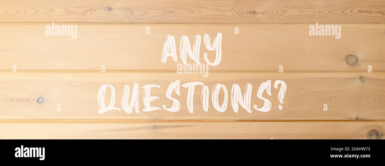 Any questions symbol. Concept words Any questions on beautiful wooden ...