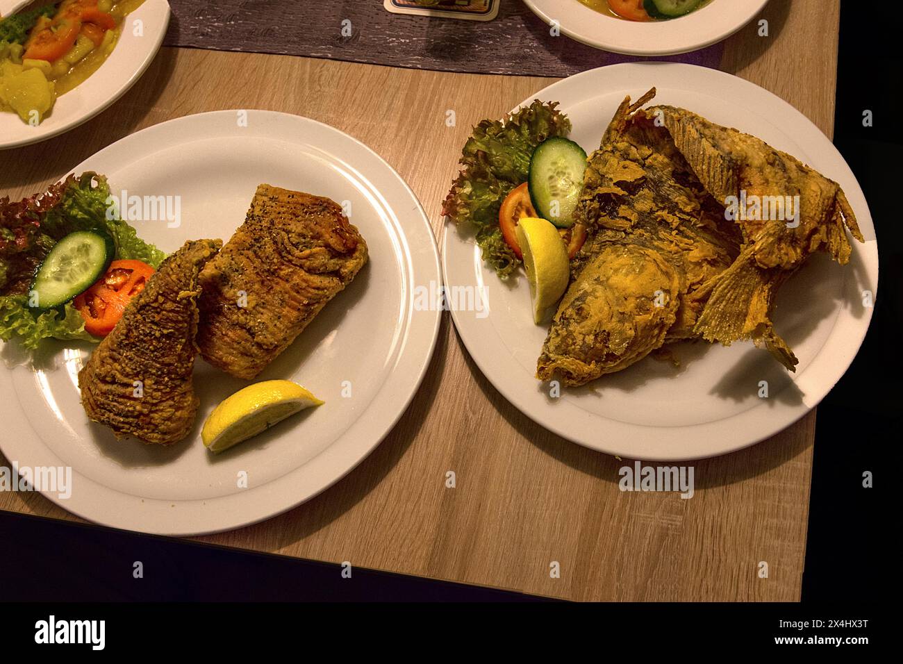 Baked Common carp and baked carp fillet served in an inn, Franconia ...