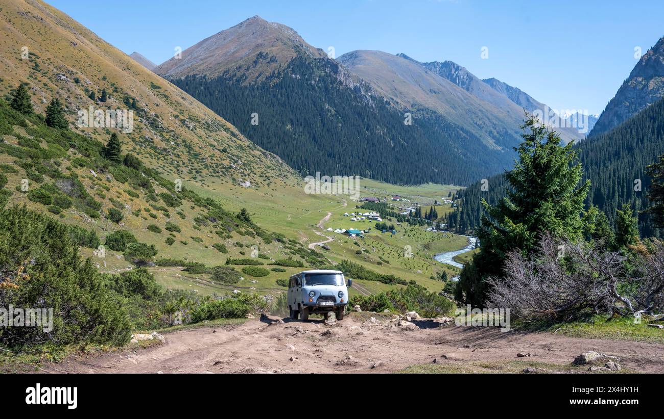 UAZ Buchanka, Russian off-road vehicle on 4x4 track, green mountain ...
