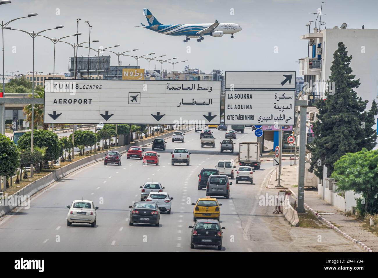 The Tunis center highway with the plane landing in the Tunisia airport ...