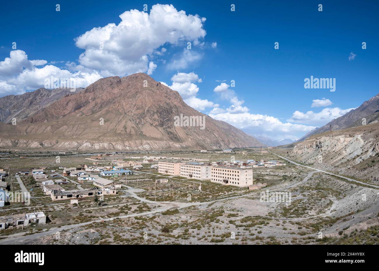 Town view, Abandoned buildings in barren landscape, Ghost town Enilchek ...