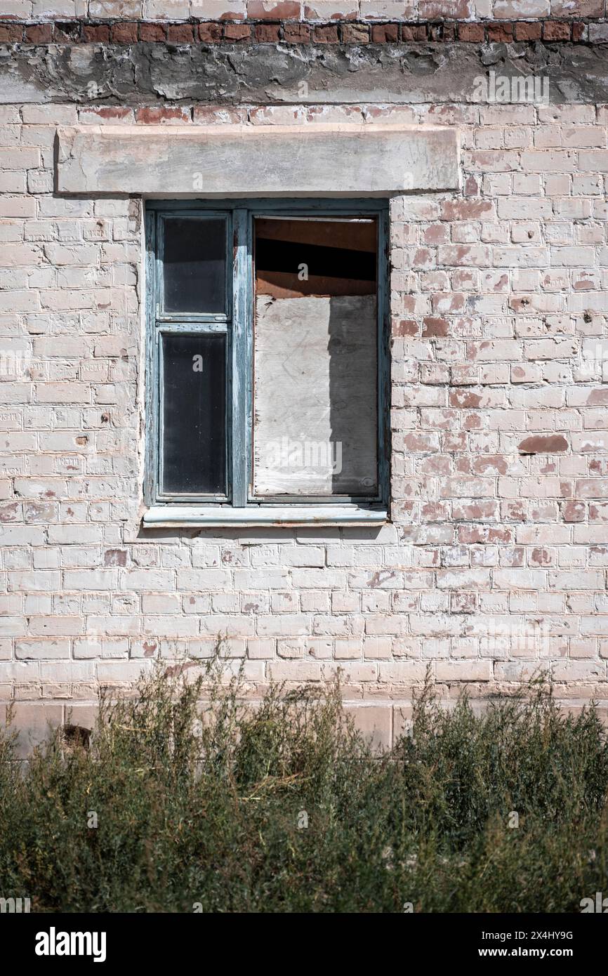 Abandoned building, window, ghost town Enilchek in the Tien Shan ...