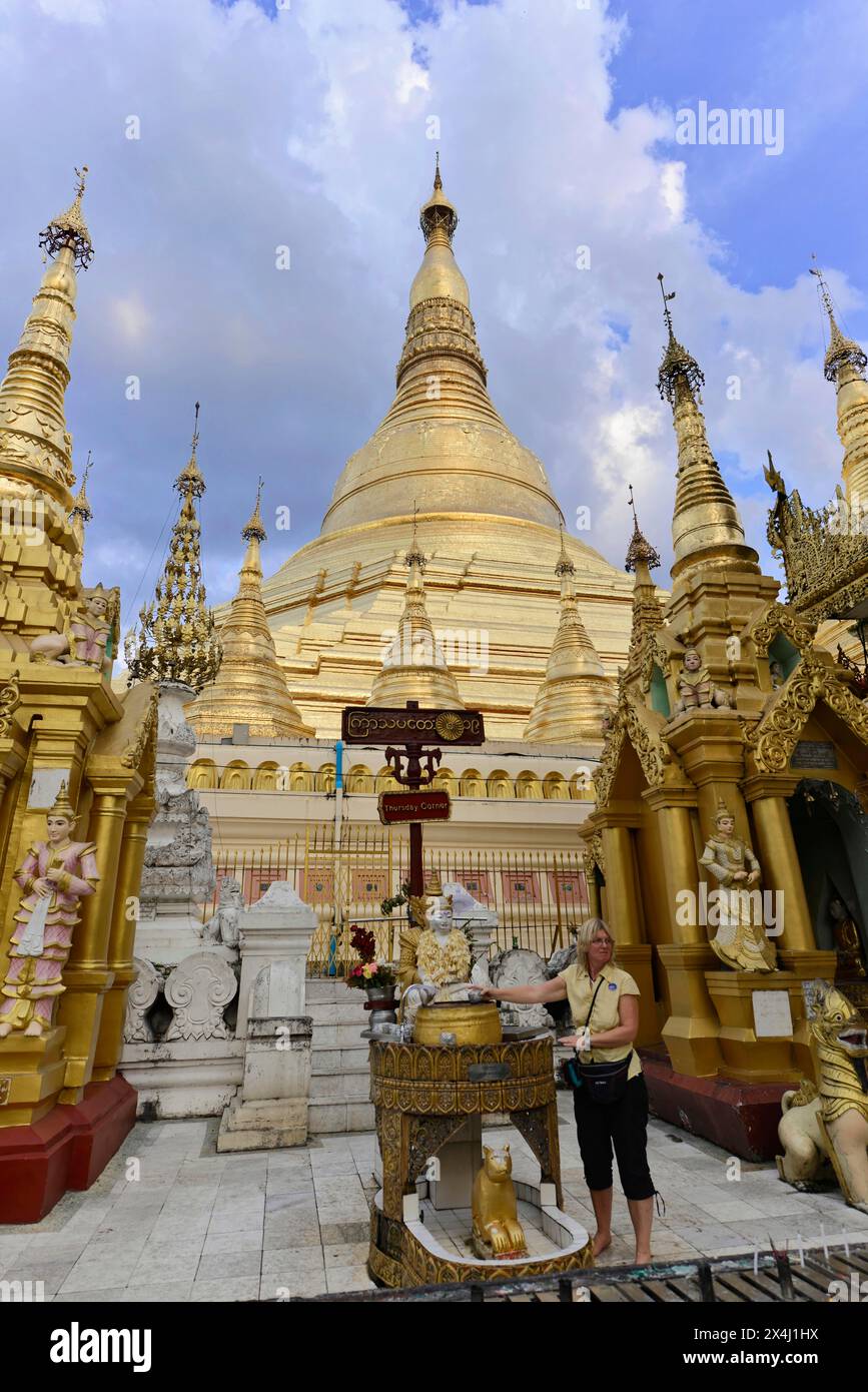 Pilgrims at Shwedagon Pagoda, Yangon, Myanmar, Asia, Visitors surround ...