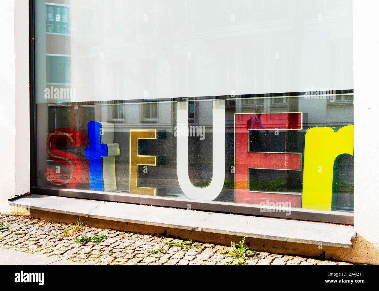 Advertising on the shop window of a tax office, Berlin, Germany Stock ...
