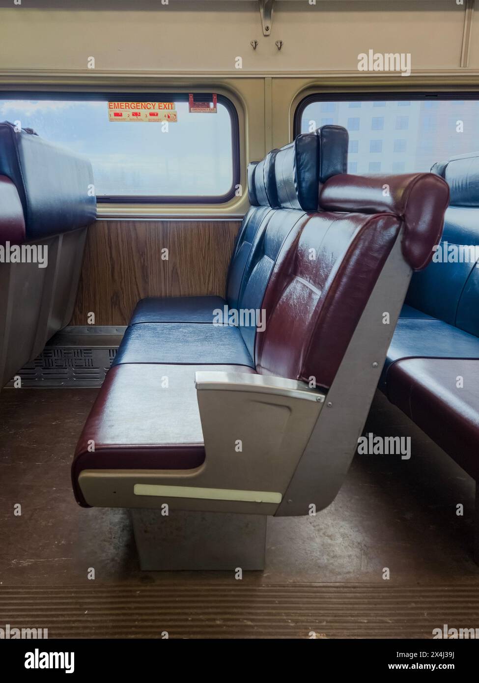 Empty row of seats on a commuter train Stock Photo - Alamy