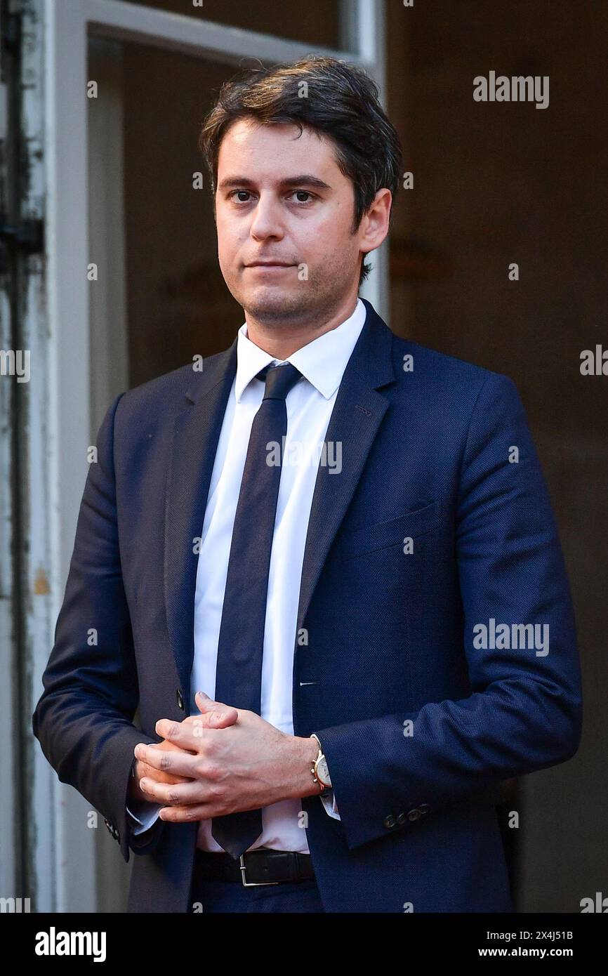 French Prime Minister Gabriel Attal looks on at the end of a meeting ...