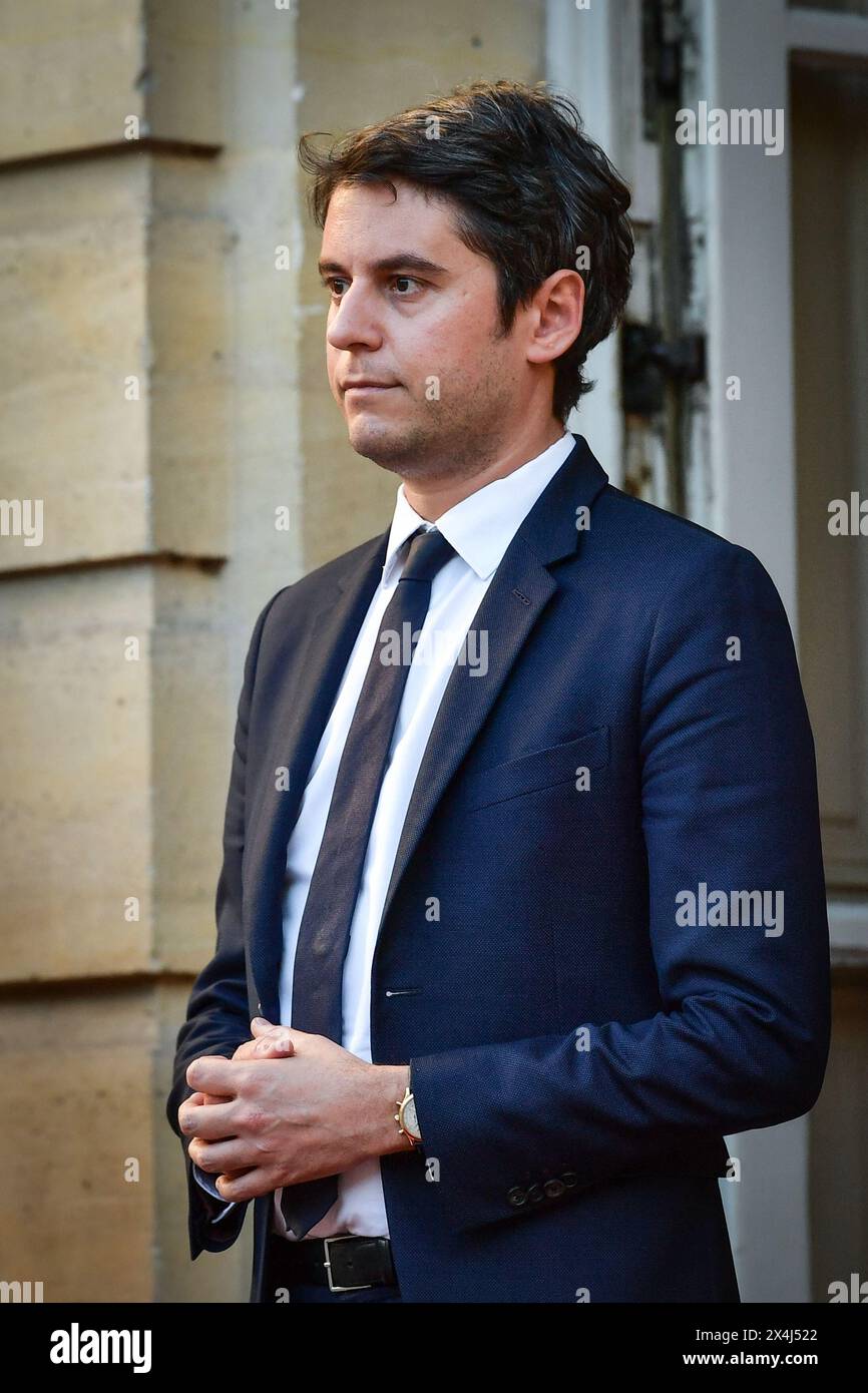 French Prime Minister Gabriel Attal looks on at the end of a meeting ...