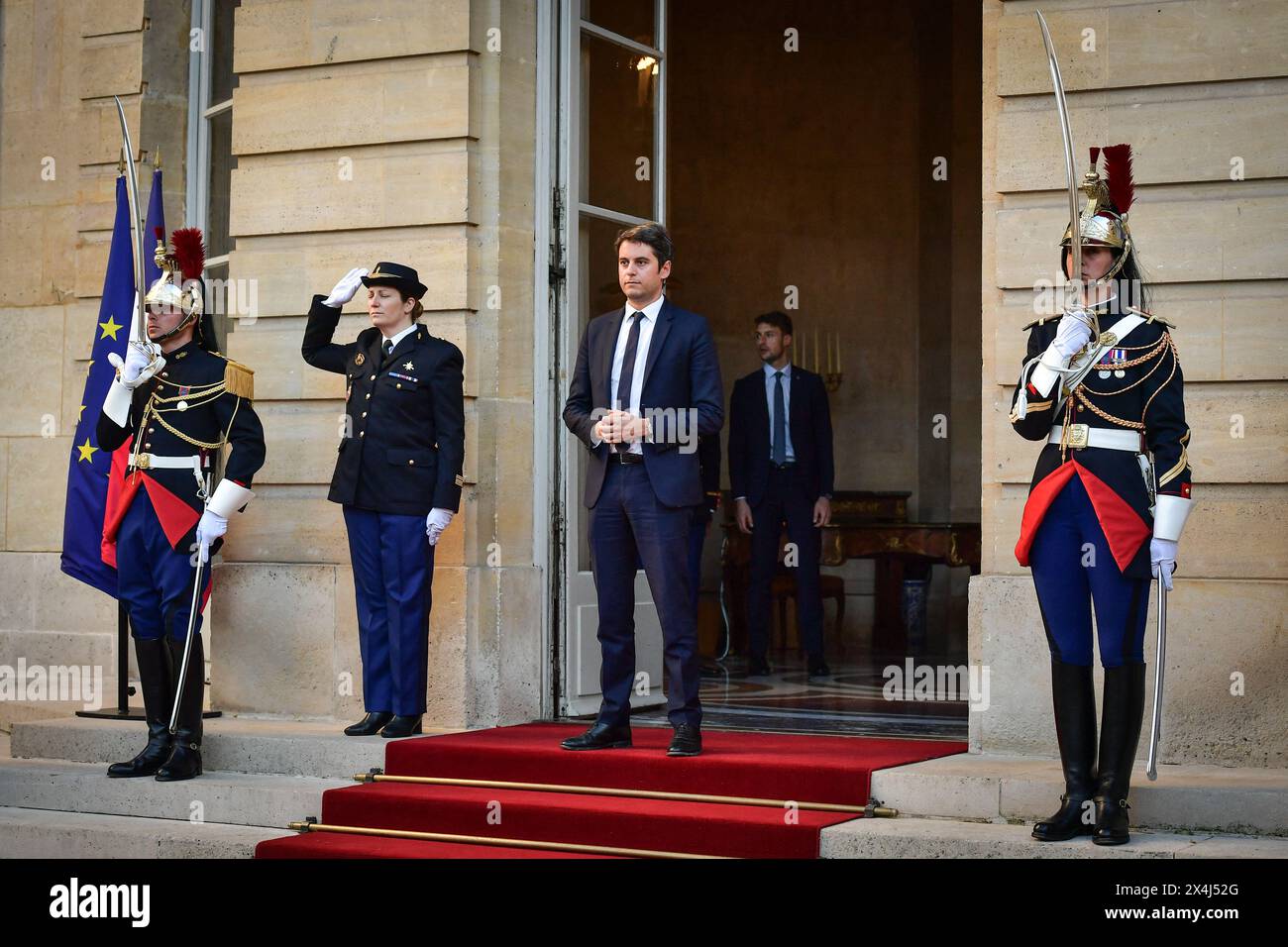 French Prime Minister Gabriel Attal looks on at the end of a meeting ...
