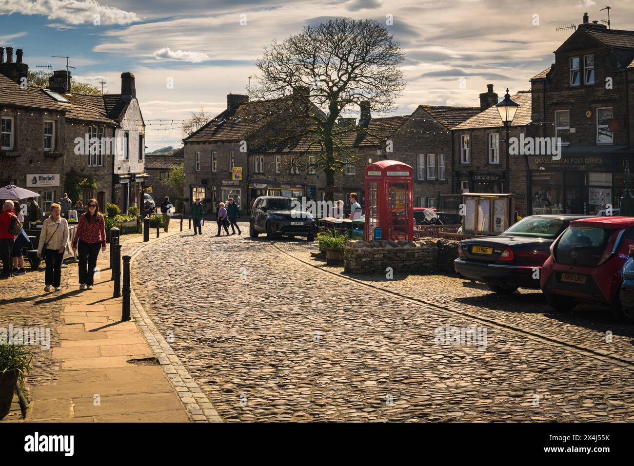 A bright spring HDR landscape image of The Square, Grassington village ...
