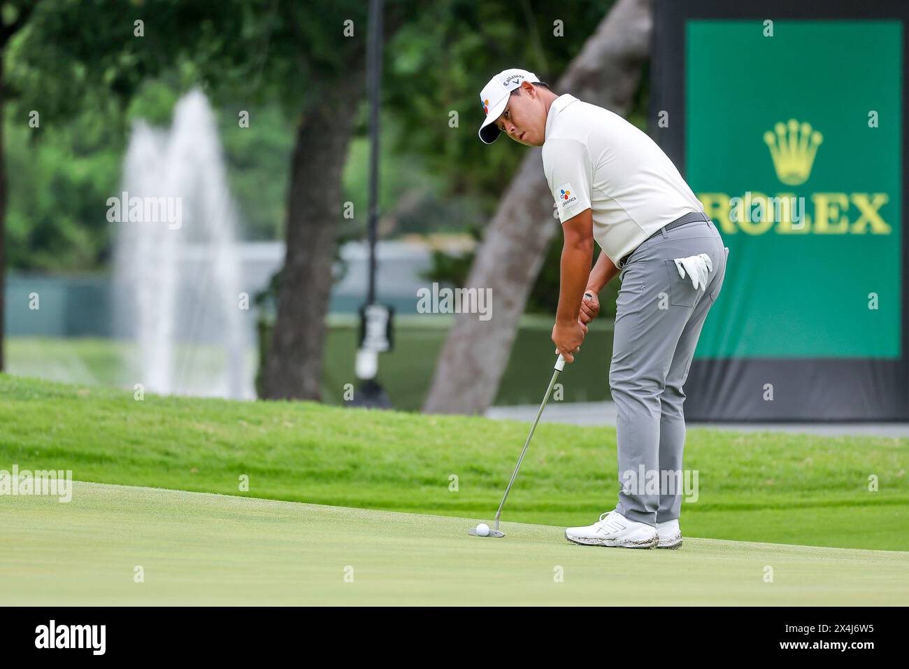 McKinney, TX, USA. 03rd May, 2024. Si Woo Kim sizes up his putt on the ...