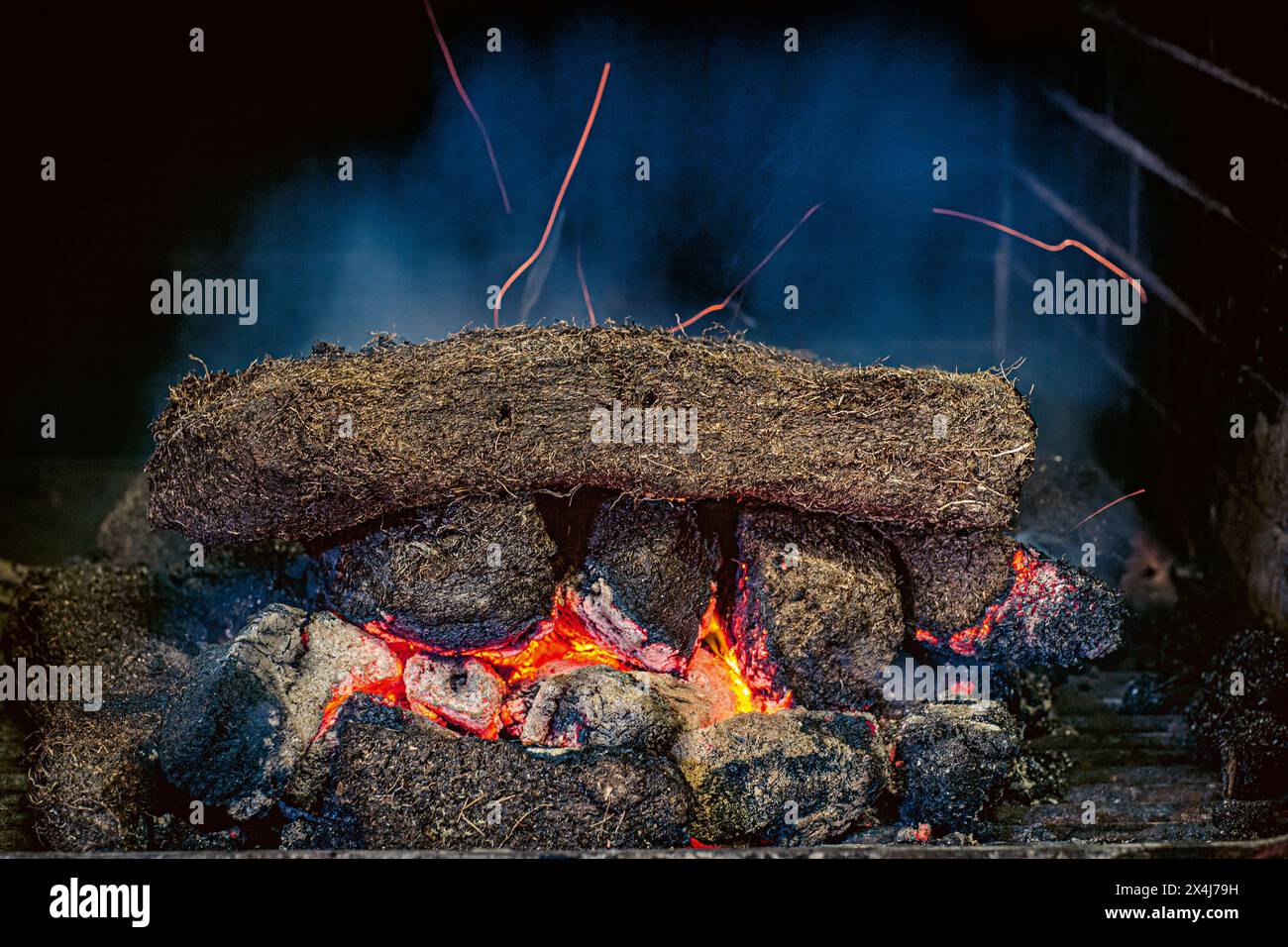 Peat fire in a whisky distillery kiln at Kilchoman distillery , Islay ...