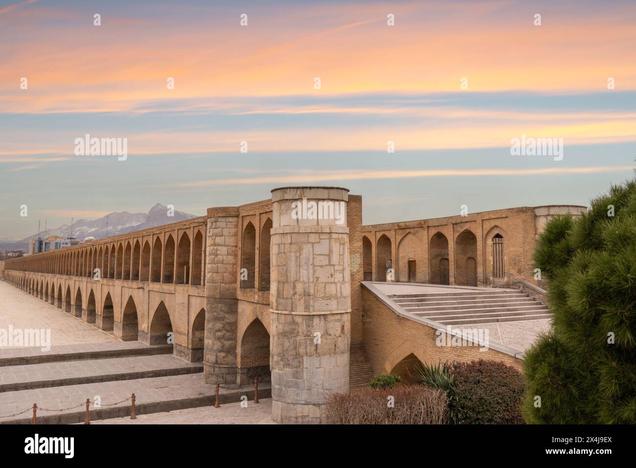 Dusk view of the dry riverbed and 33-arch double-decker bridge (also ...