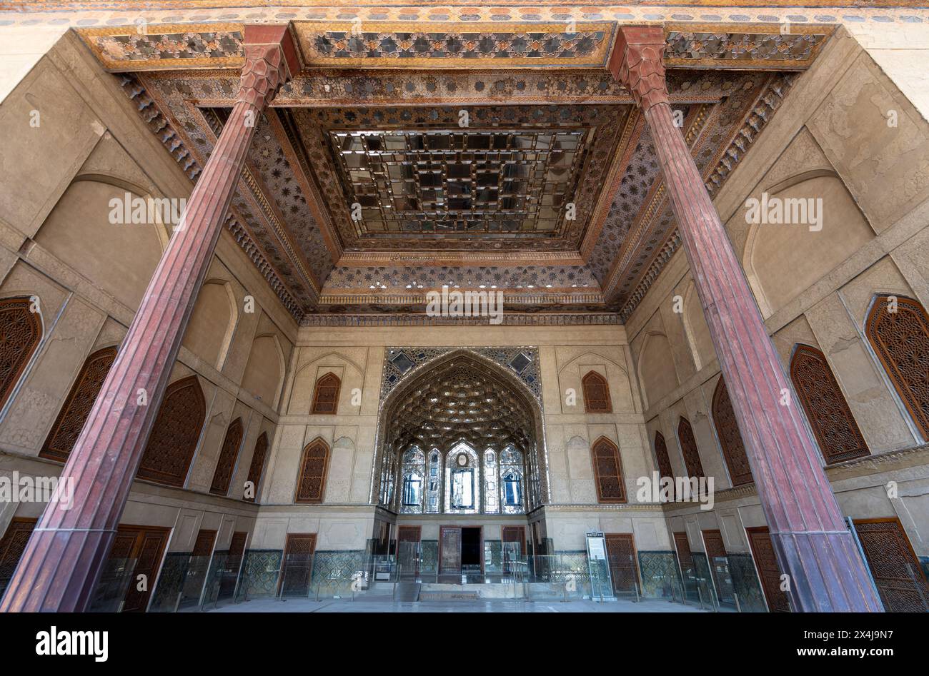 Intricate Persian architecture inside Chehel Sotun Palace. Reflective ...