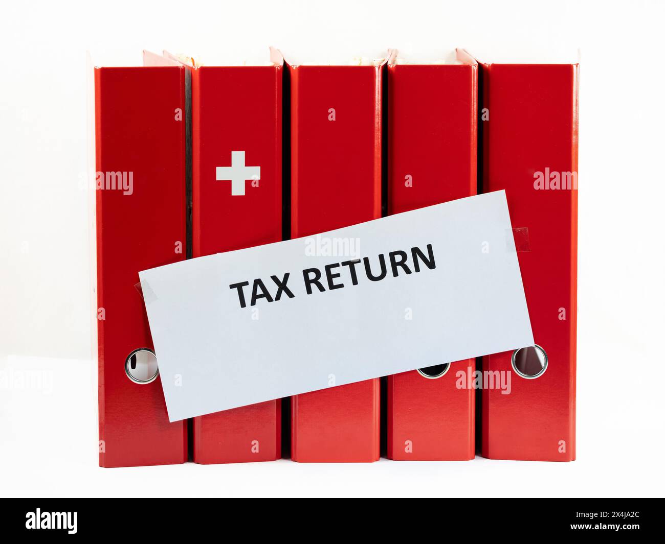 Concept for Swiss tax return. Office folders with Swiss flag symbol and ...