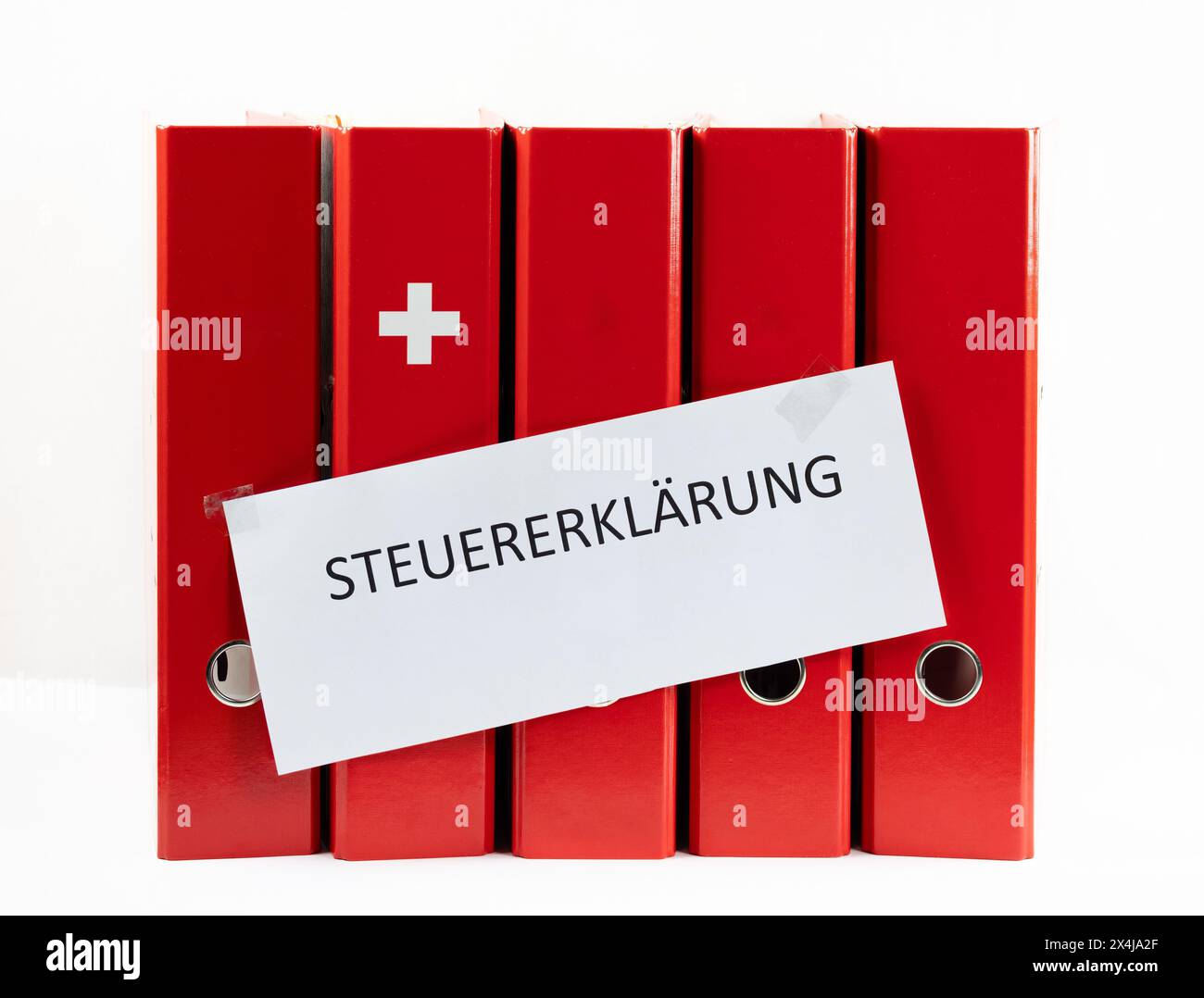 Concept for Swiss tax return. Office folders with Swiss flag symbol ...