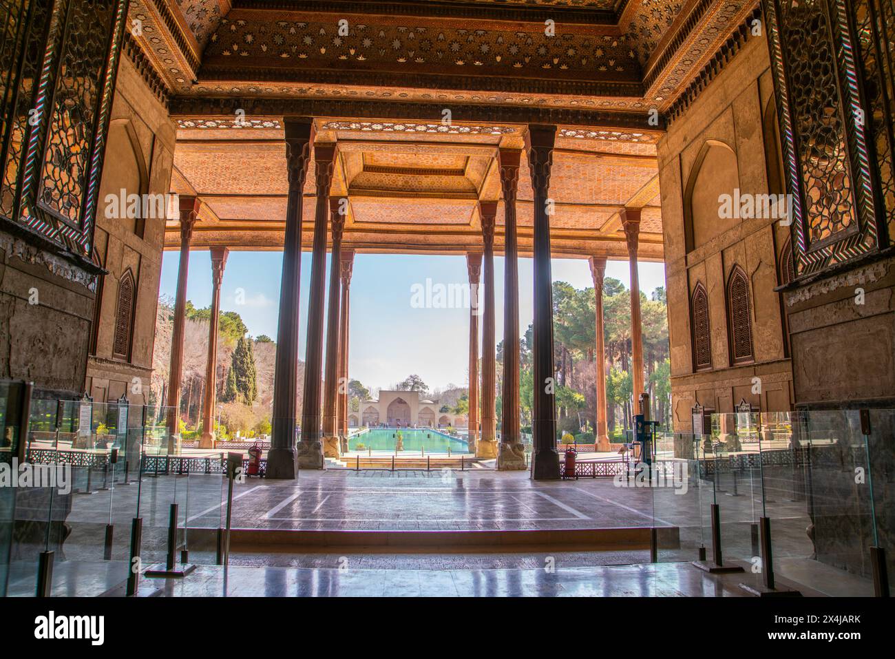 Intricate Persian architecture inside Chehel Sotun Palace. Reflective ...
