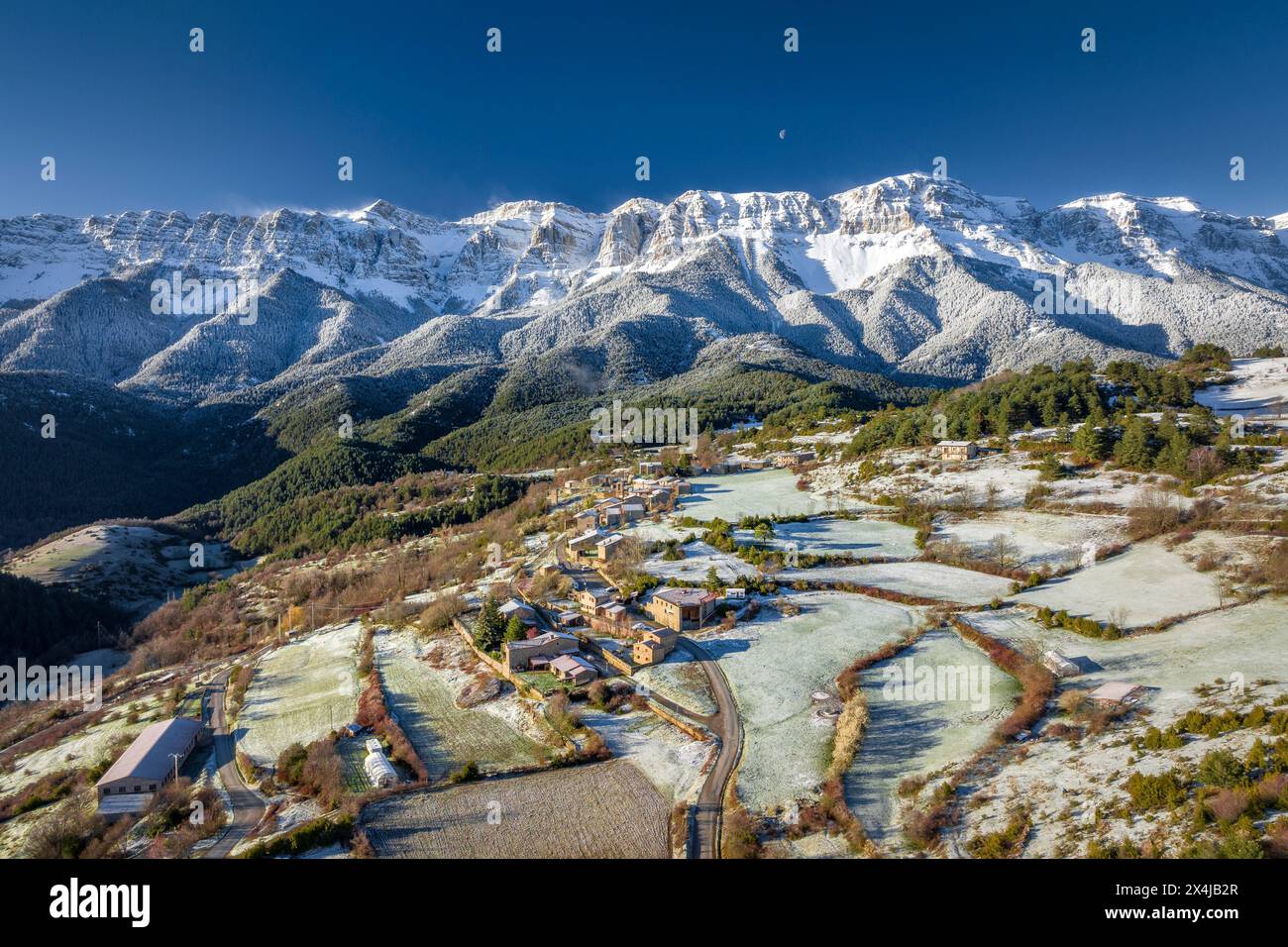 Aerial view of the town of Estana and the Serra del Cadí on a winter ...