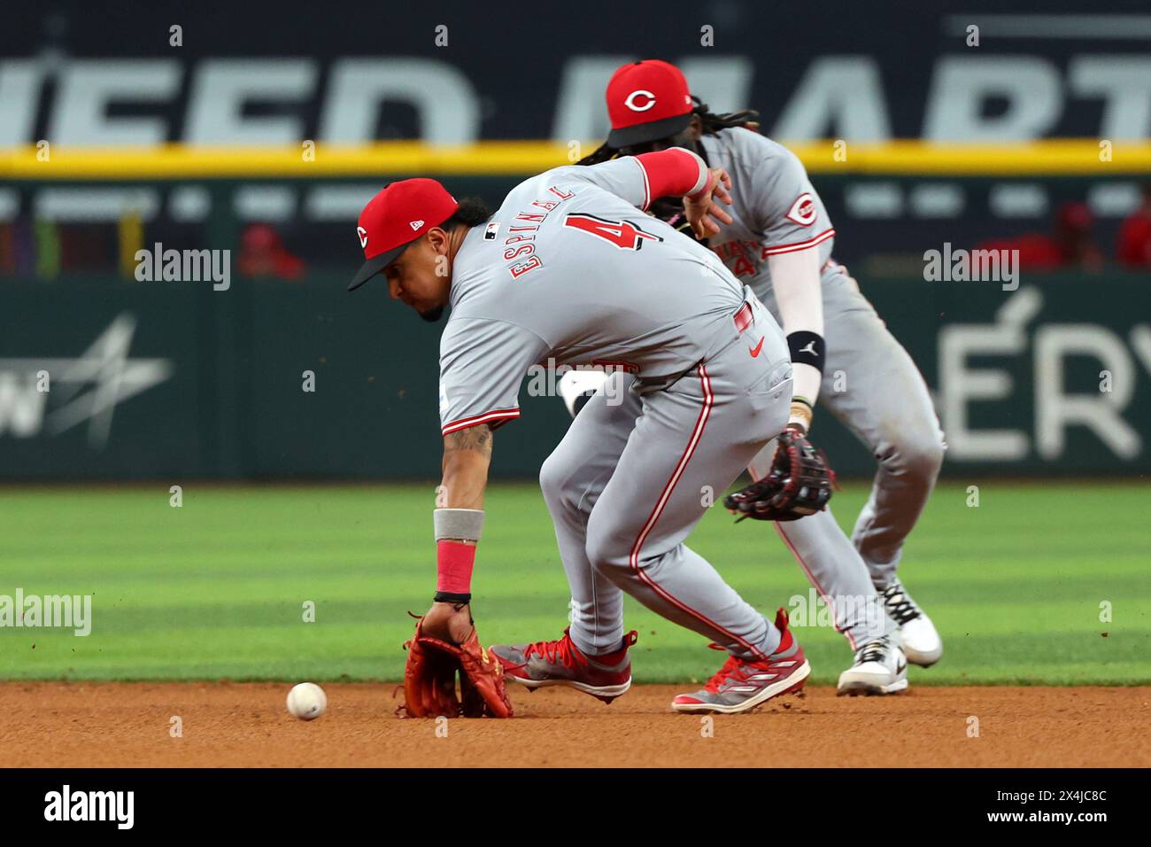 Cincinnati Reds second baseman Santiago Espinal (4) fields a ground ...
