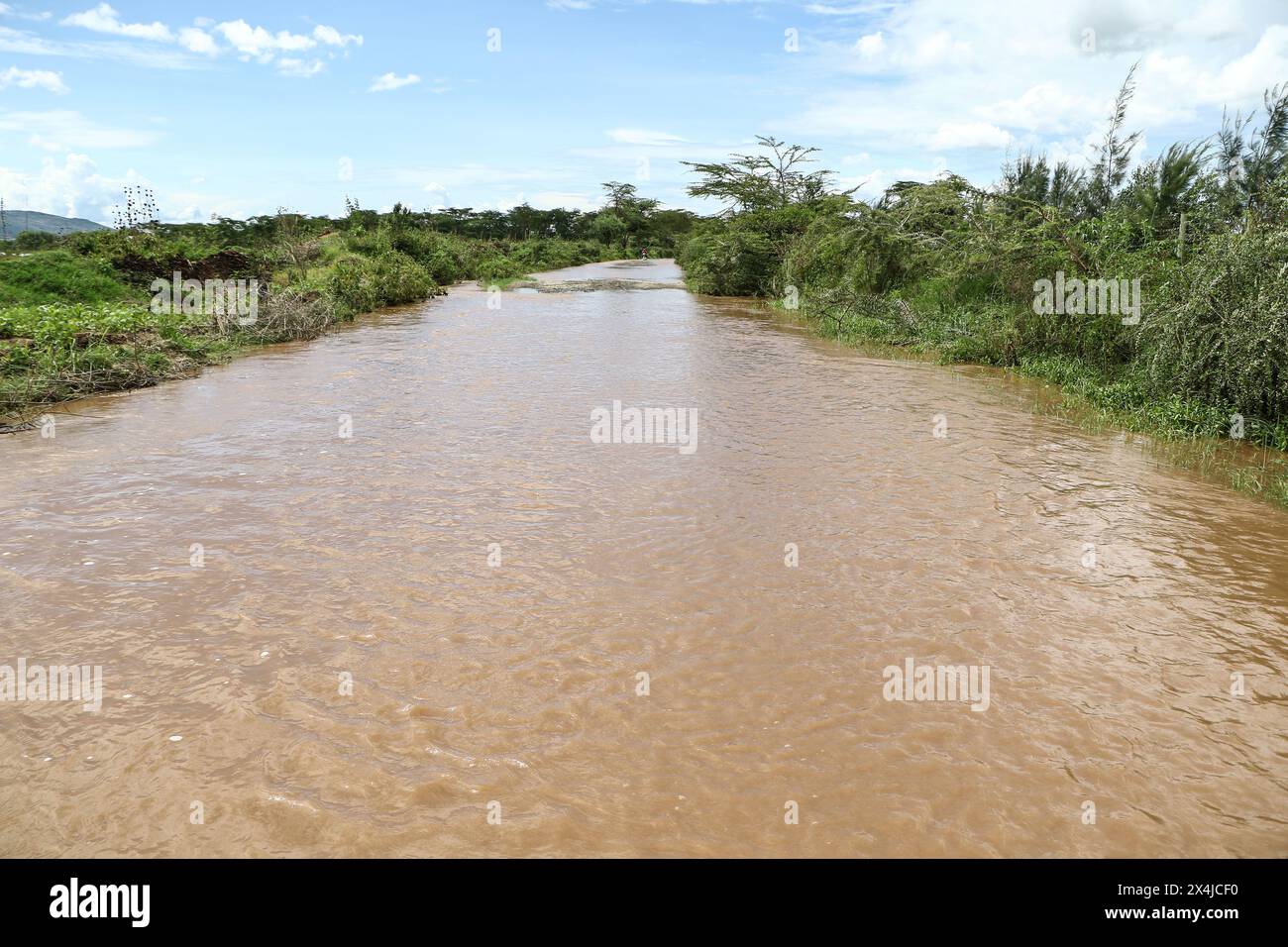 A flooded road seen in Rongai, Nakuru County, following increased ...