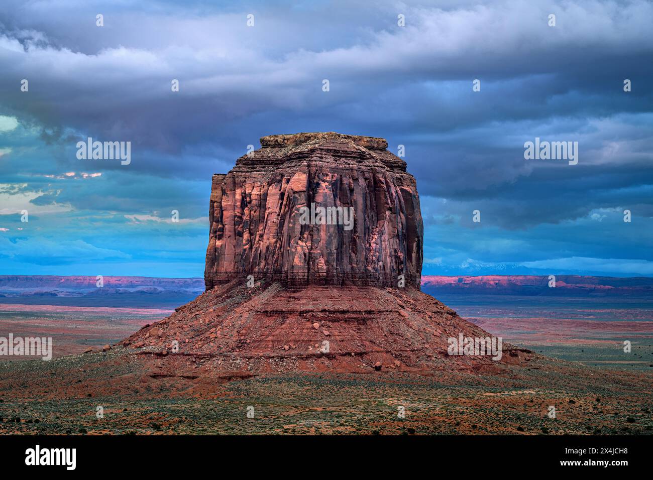 Close up of Merrick Butte in Monument Valley during dusk complemented ...