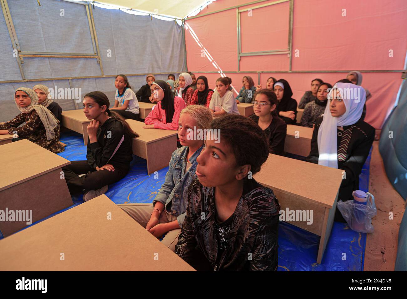 Gaza. 30th Apr, 2024. Palestinian students are seen in a classroom at a ...