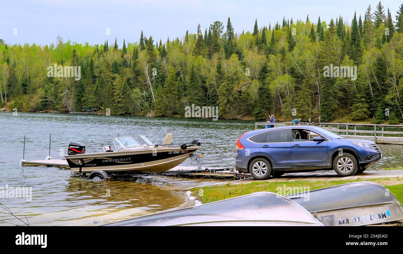 CLEARWATER CO, MN - 23 MAY 2020: Fishing boat with outboard motor on a ...