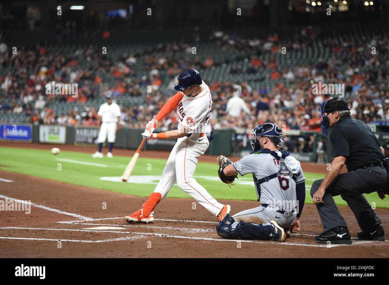Houston Astros outfielder Kyle Tucker (30), Cleveland Guardians catcher David Fry (6), and ...