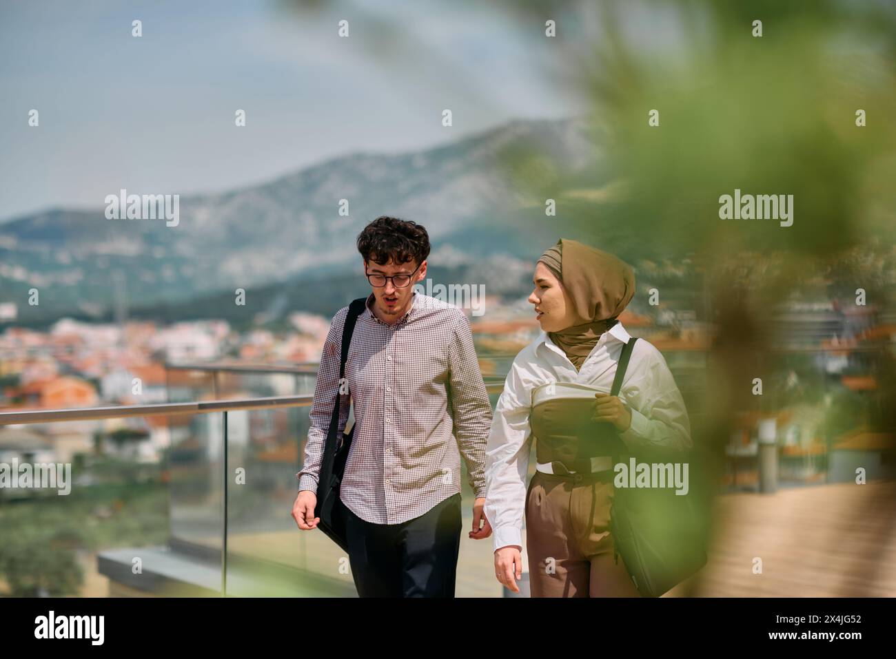 After a day at the office, a business man engages in conversation with ...