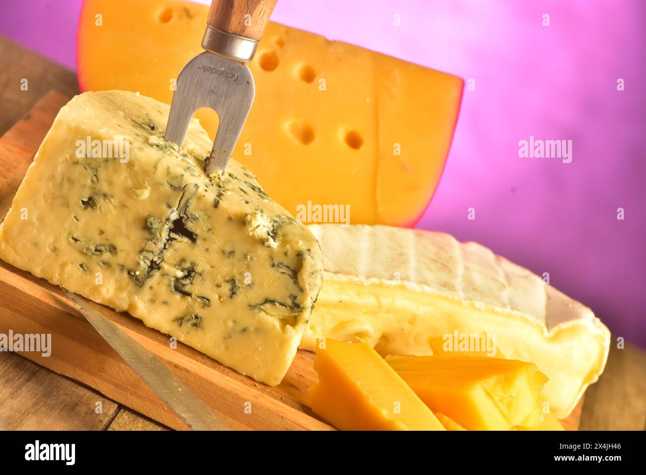 Table of cheese on studio shot Stock Photo - Alamy