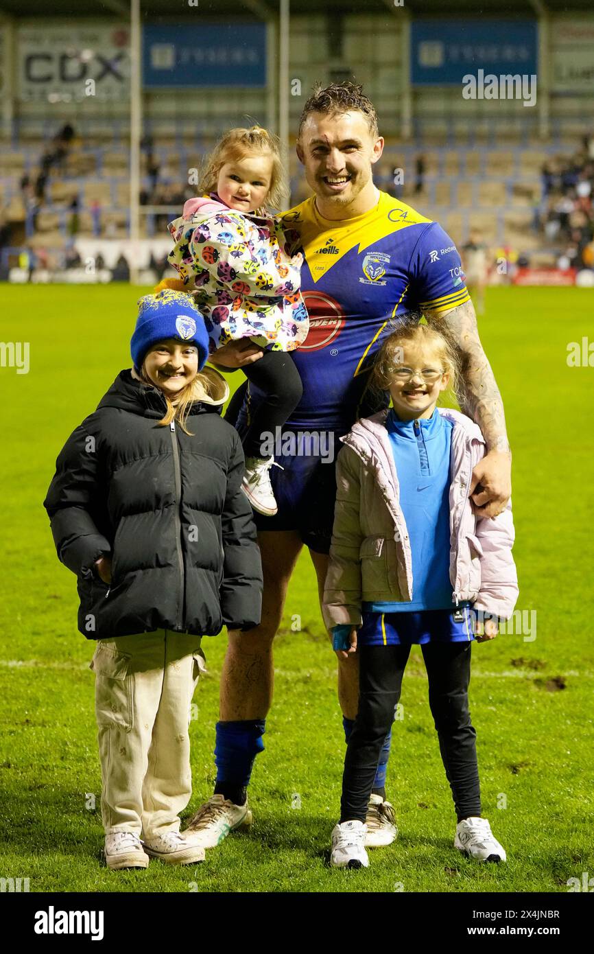 Sam Powell of Warrington Wolves poses for a photo with his family after ...