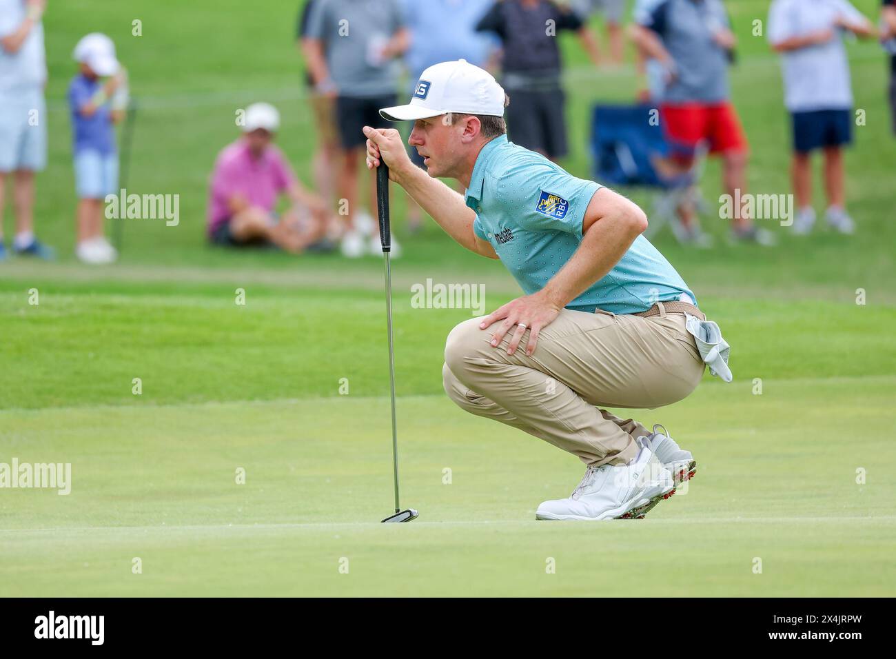McKinney, TX, USA. 03rd May, 2024. Mackenzie Hughes sizes up his putt ...