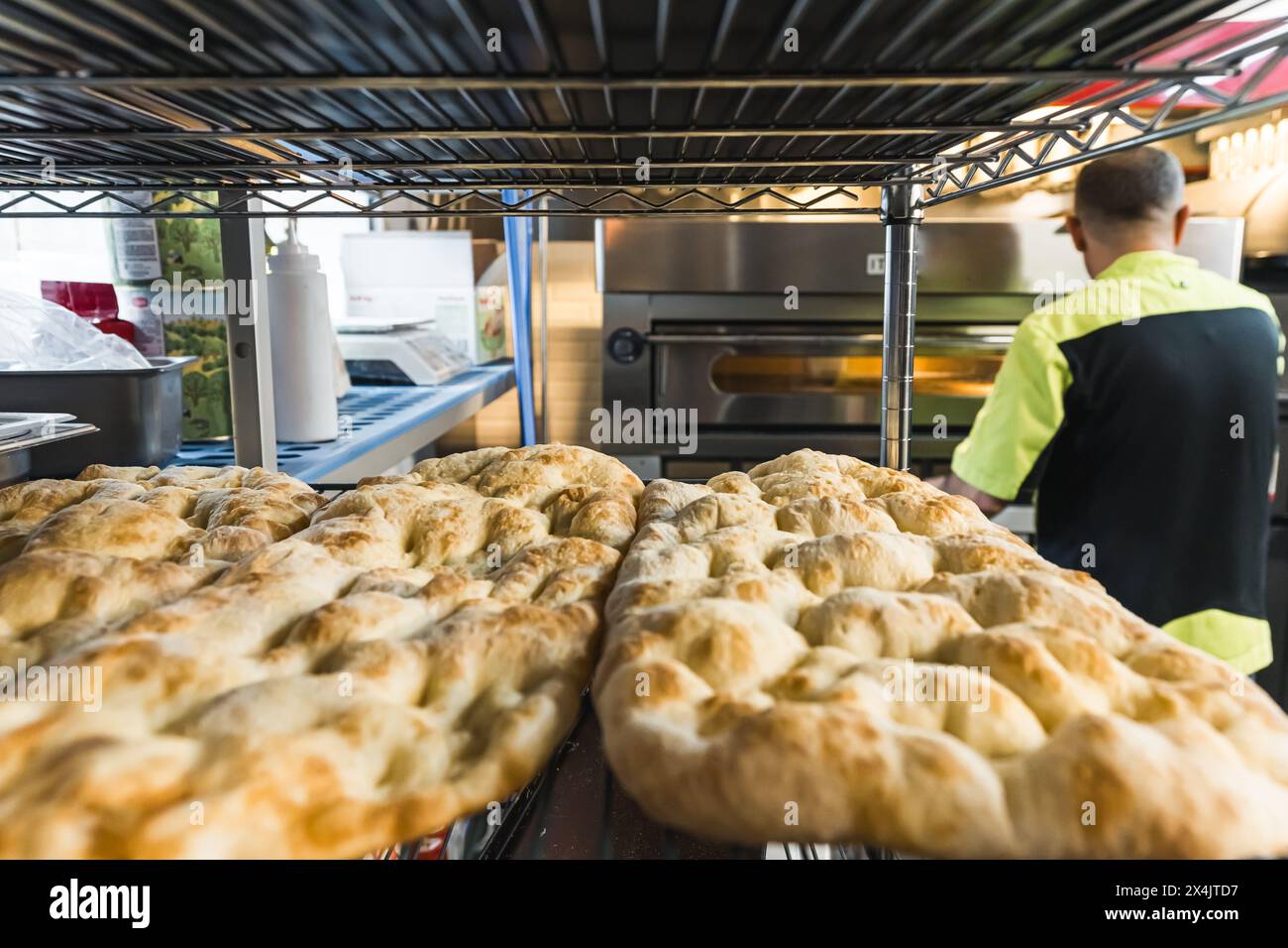 pizza making process in an oven, pastry and bakery, cook in the ...