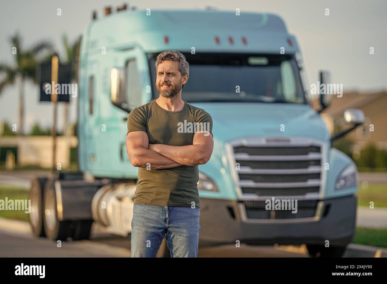 man driver near lorry. Semi trucks vehicle. Trucking owner. hispanic ...