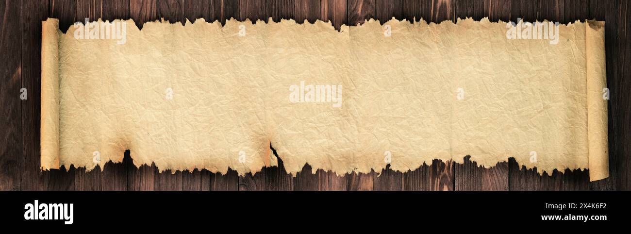 Panoramic background of old paper. Unfolded scroll on the table Stock ...